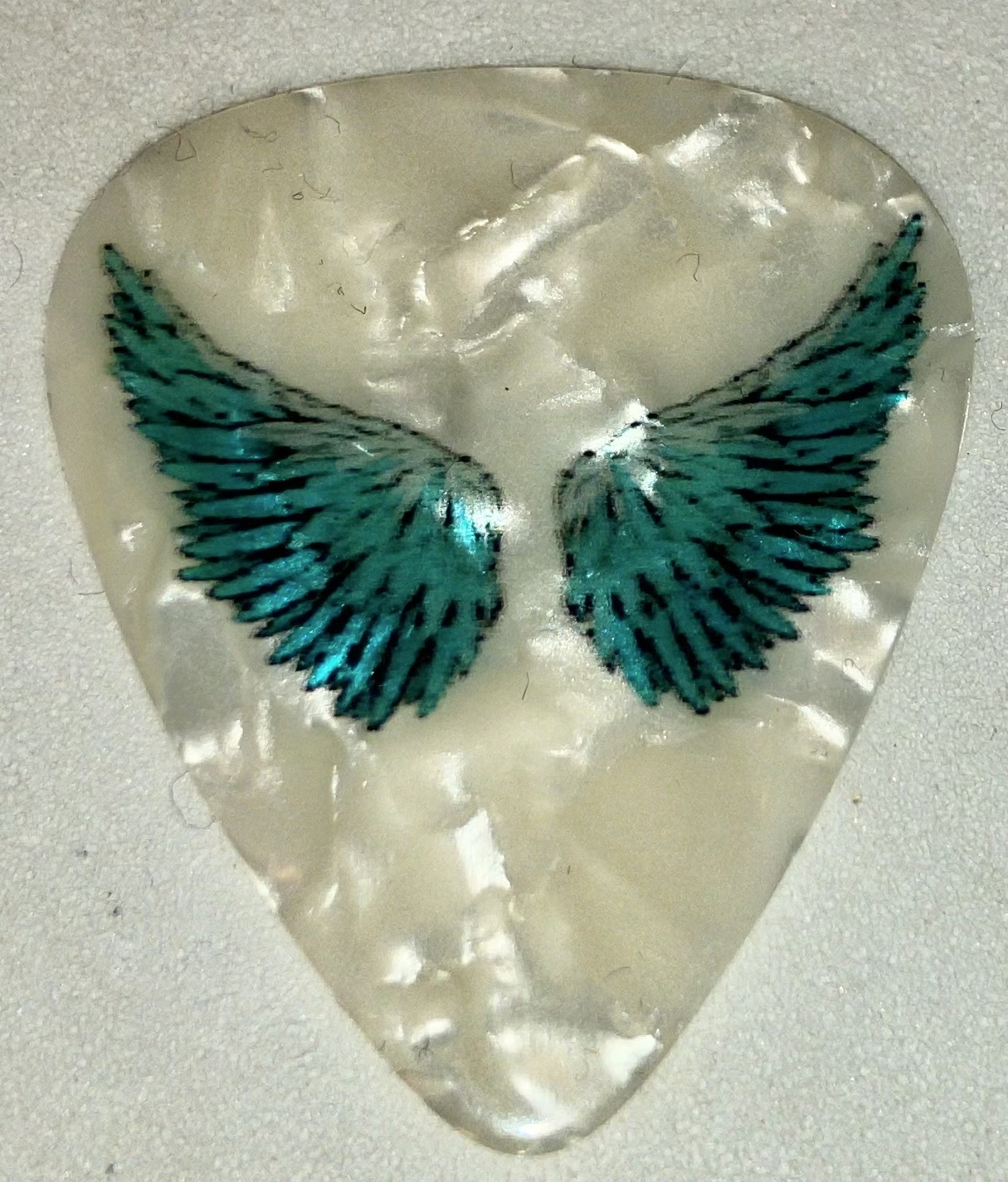 Angel Wings Guitar Pick detailed Blue on Pearloid Celluloid - Pickbay